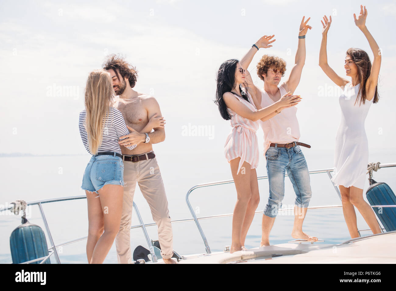 Young yoyful people having fun in boat party - Happy friends enjoying ...