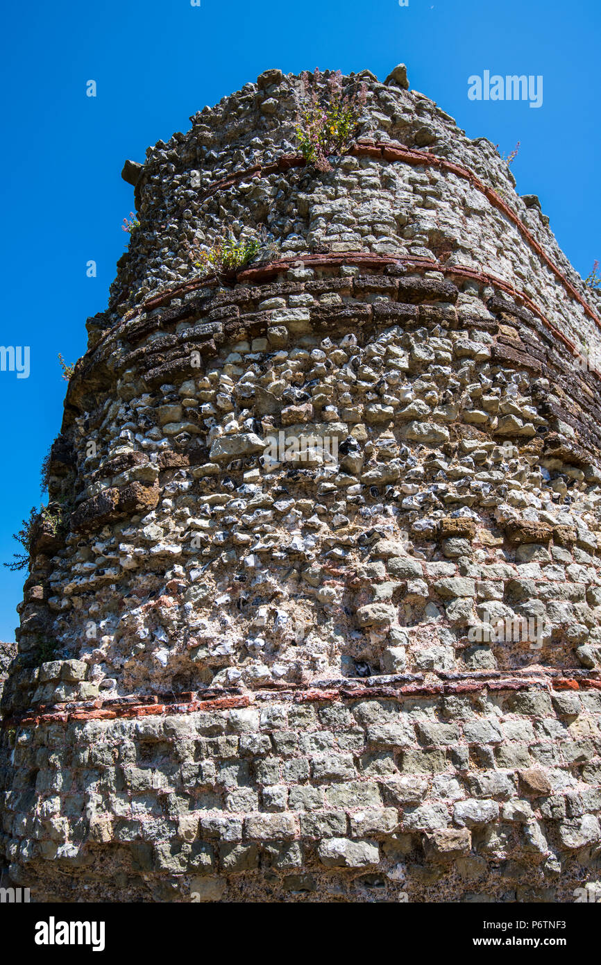 Wall of Pevensey Castle in East Sussex showing Roman brickwork and ...