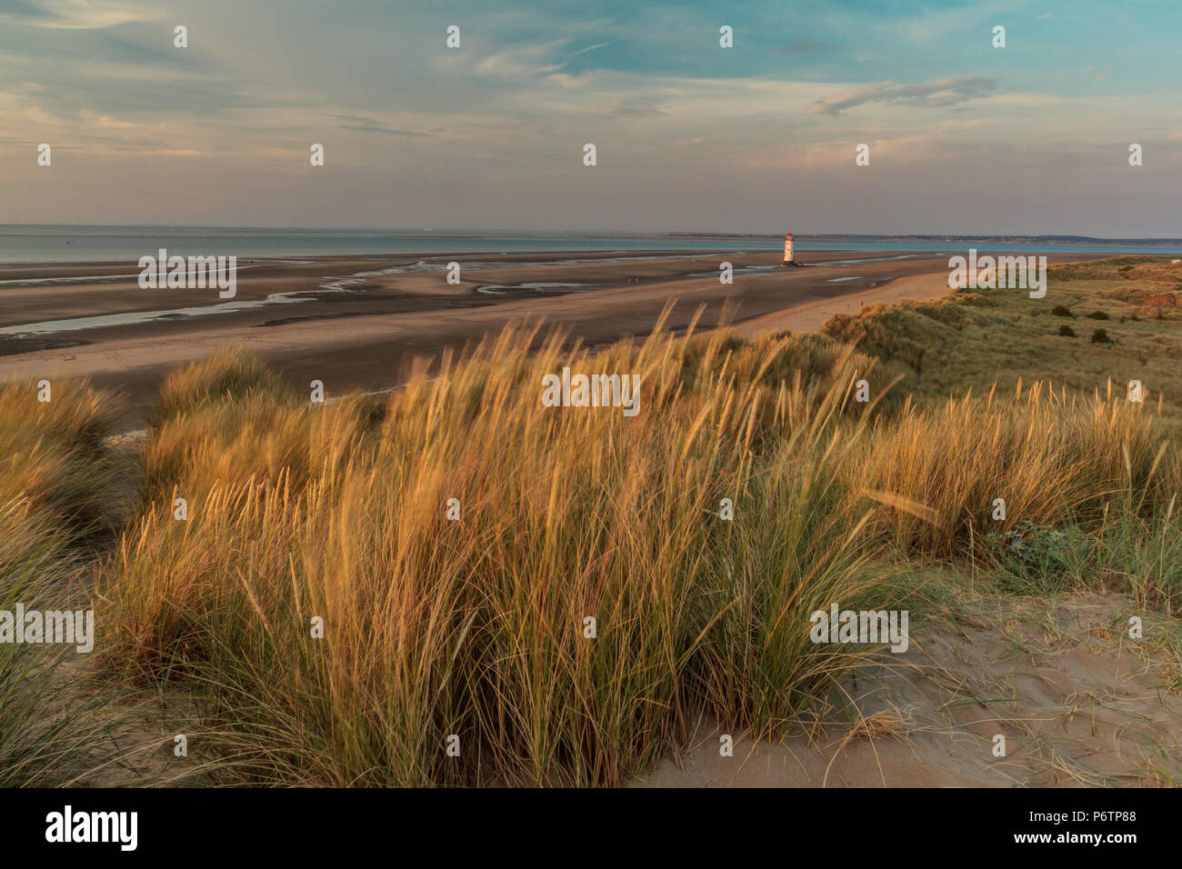 Sand dunes and the beach at Point of Ayr (Talacre) lighthouse, on the ...