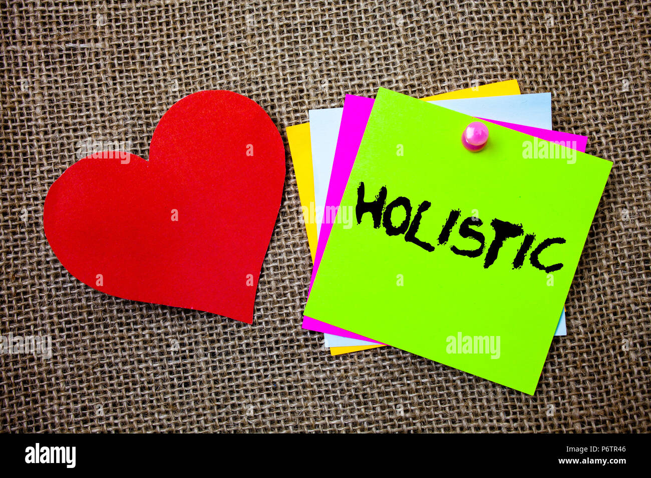 Text sign showing Holistic. Conceptual photo Belief the parts of ...
