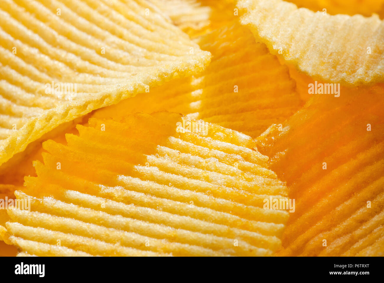 Potato chips close-up. Fast food. Food background Stock Photo - Alamy