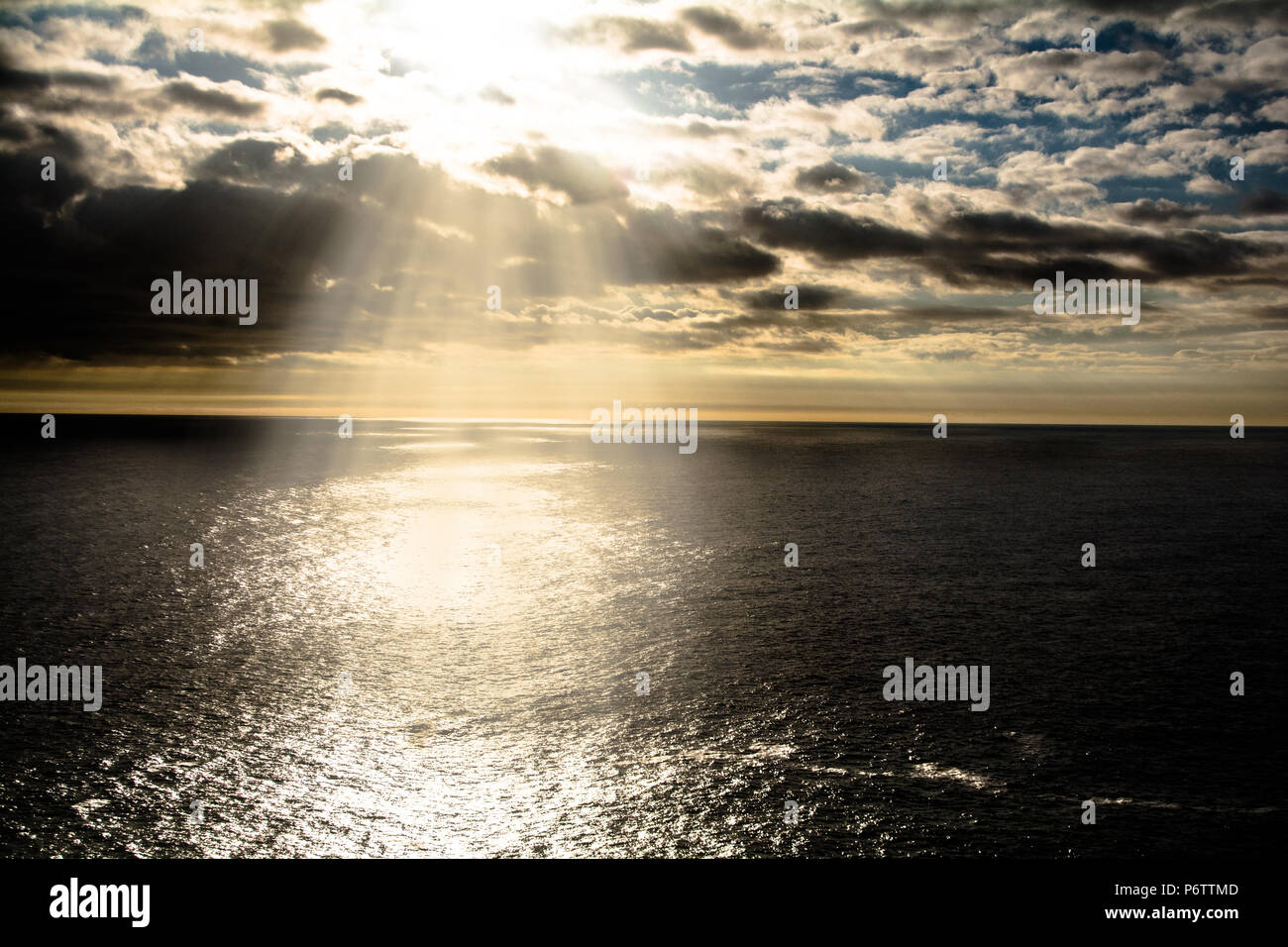Cloudy skies over the ocean hi-res stock photography and images - Alamy