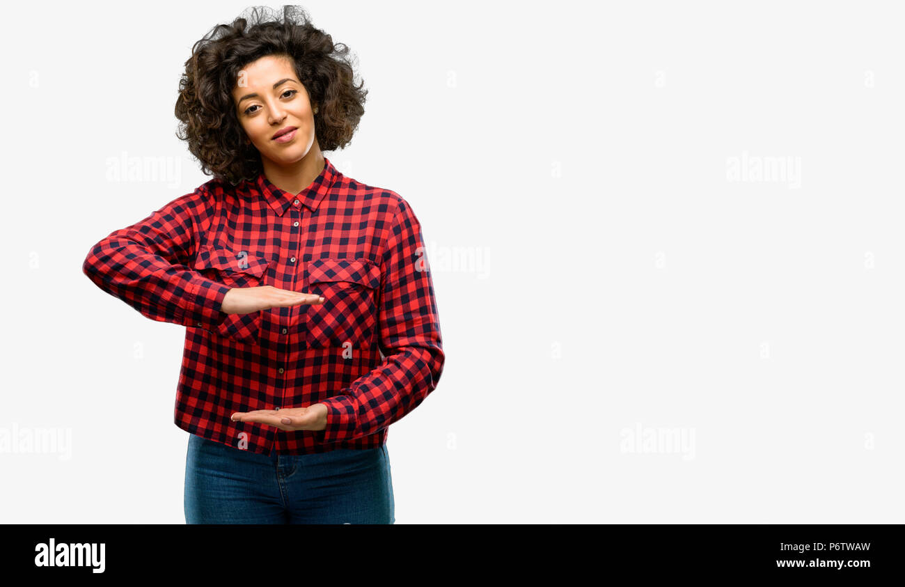 Beautiful arab woman holding Cut Out Stock Images & Pictures - Alamy