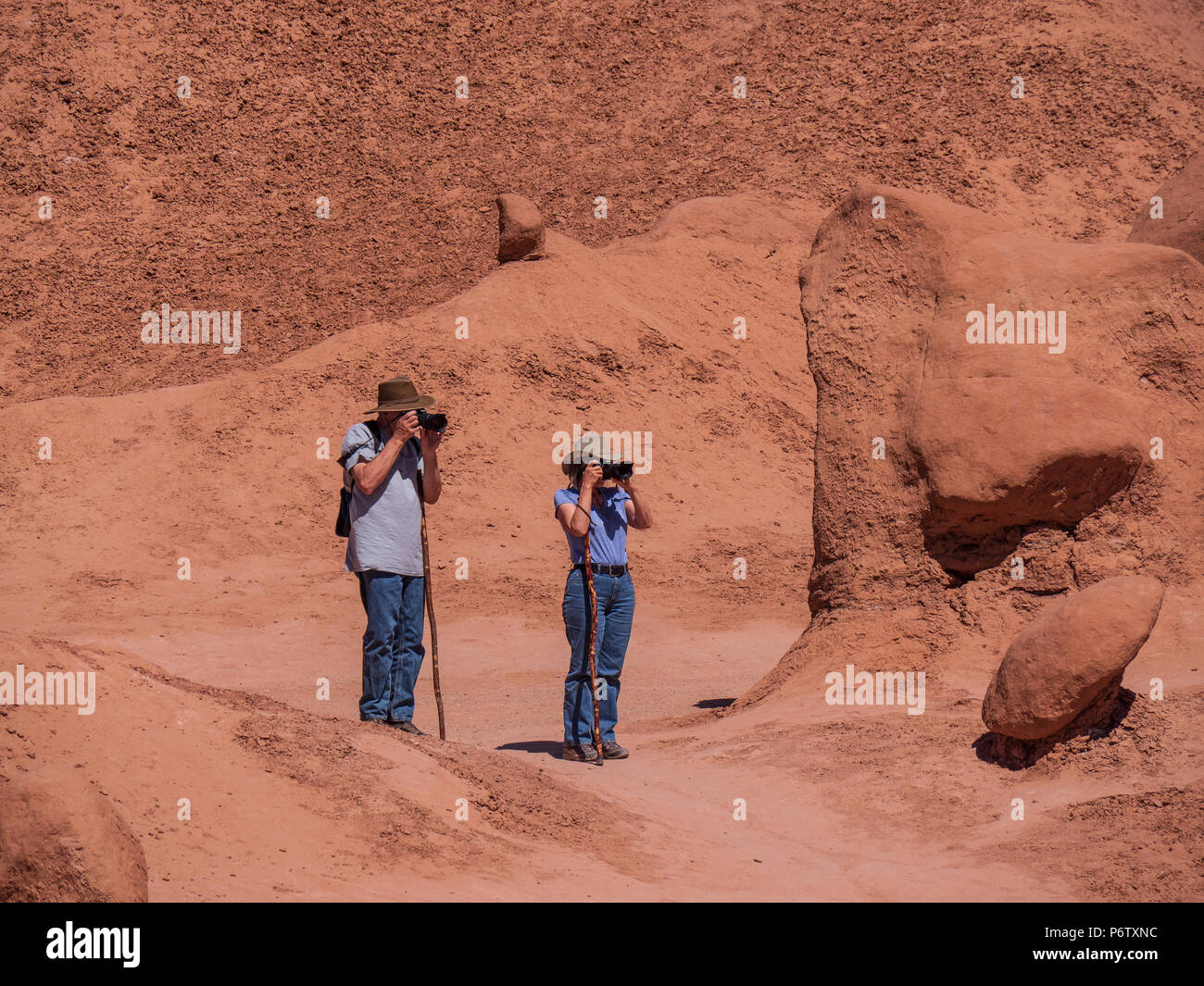 Hikers in the hoodoo area, Goblin Valley State Park, Hanksville, Utah ...