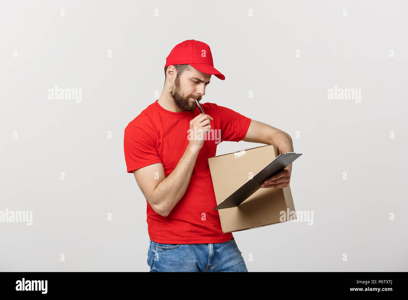 Mover guy making thinking gesture and holding clipboard isolated on ...