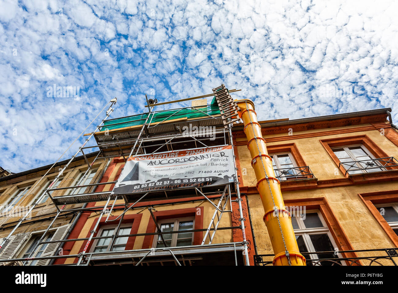 ladder hanging from top of scaffolding taken in Autun, Burgundy, France ...