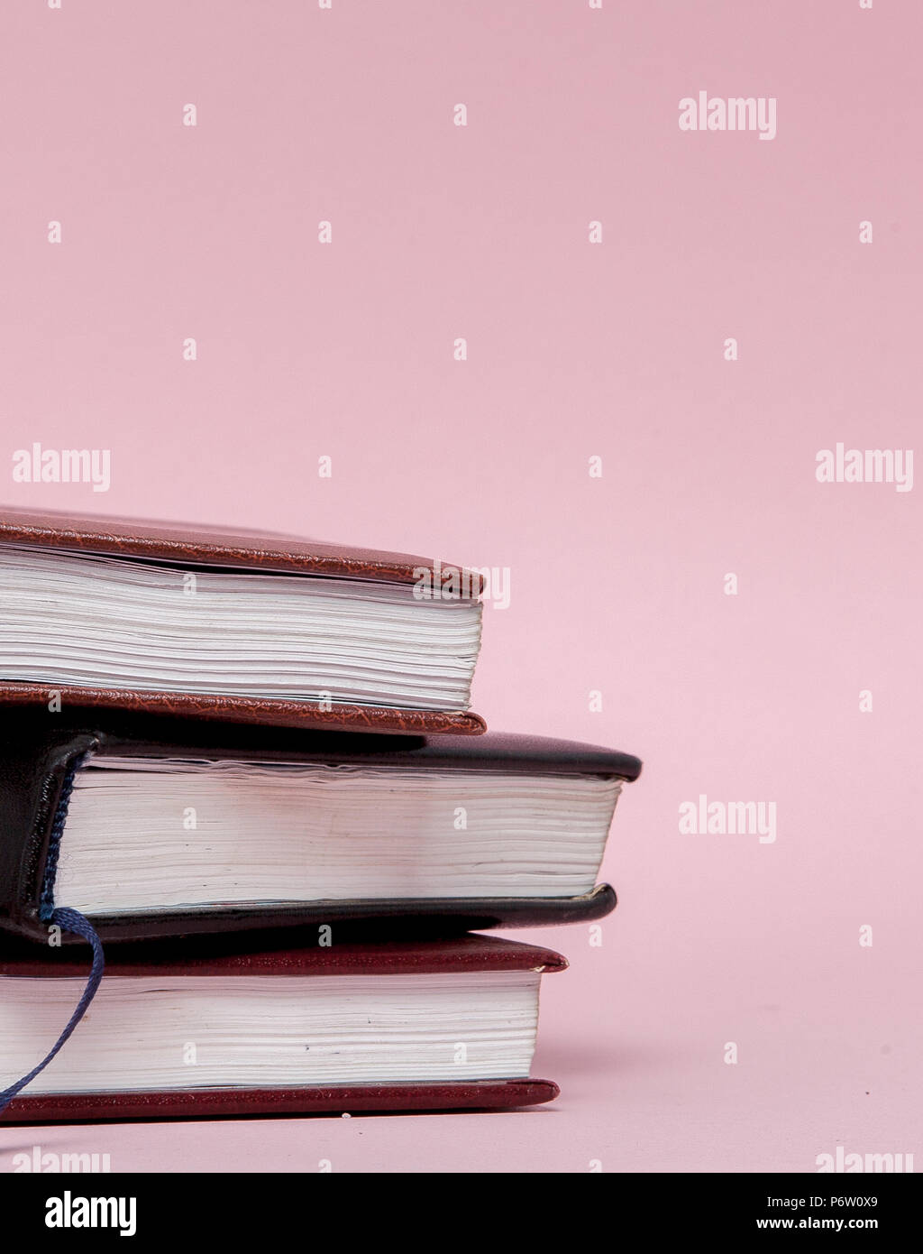 Notebook page on pink background - Flat lay Stock Photo - Alamy