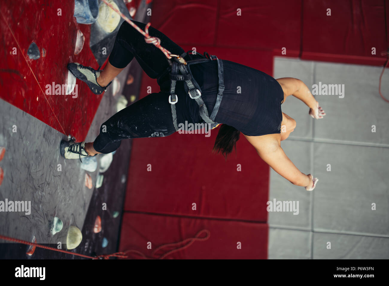 Female Climber In An Overhang On The Climbing Wall High Resolution ...