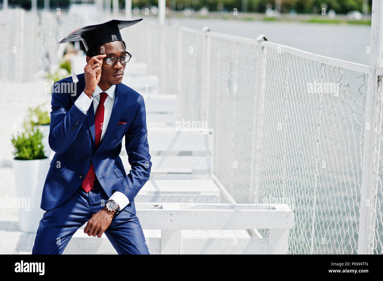 African american happy successful student at graduation hat Stock Photo ...