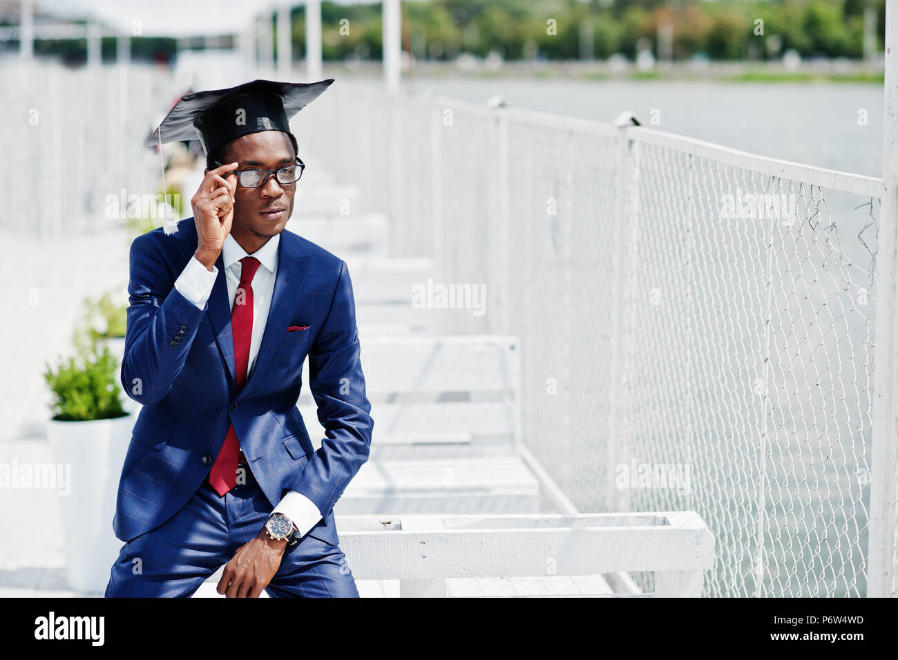 African american happy successful student at graduation hat Stock Photo ...