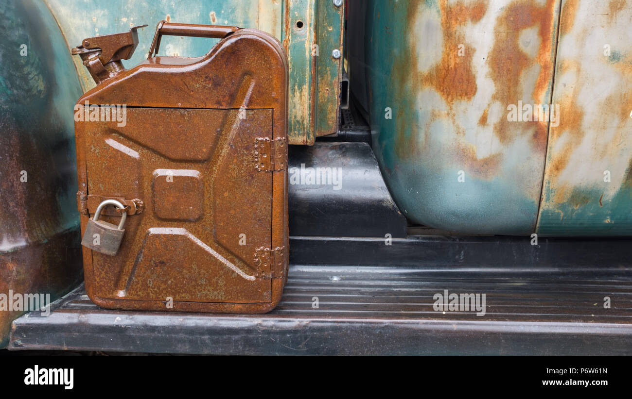 stylish old rusty gasoline canister Stock Photo - Alamy