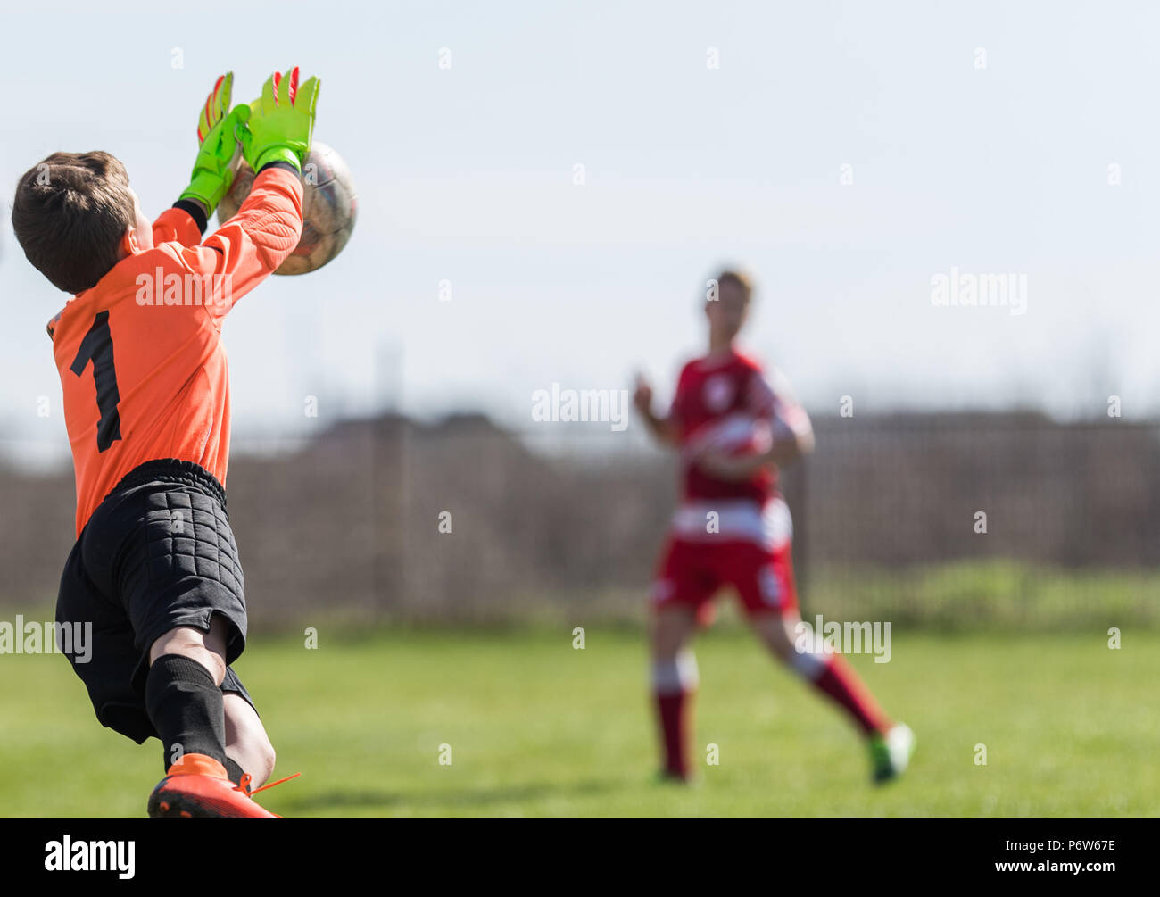 Soccer goalkeeper block soccer player hi-res stock photography and ...