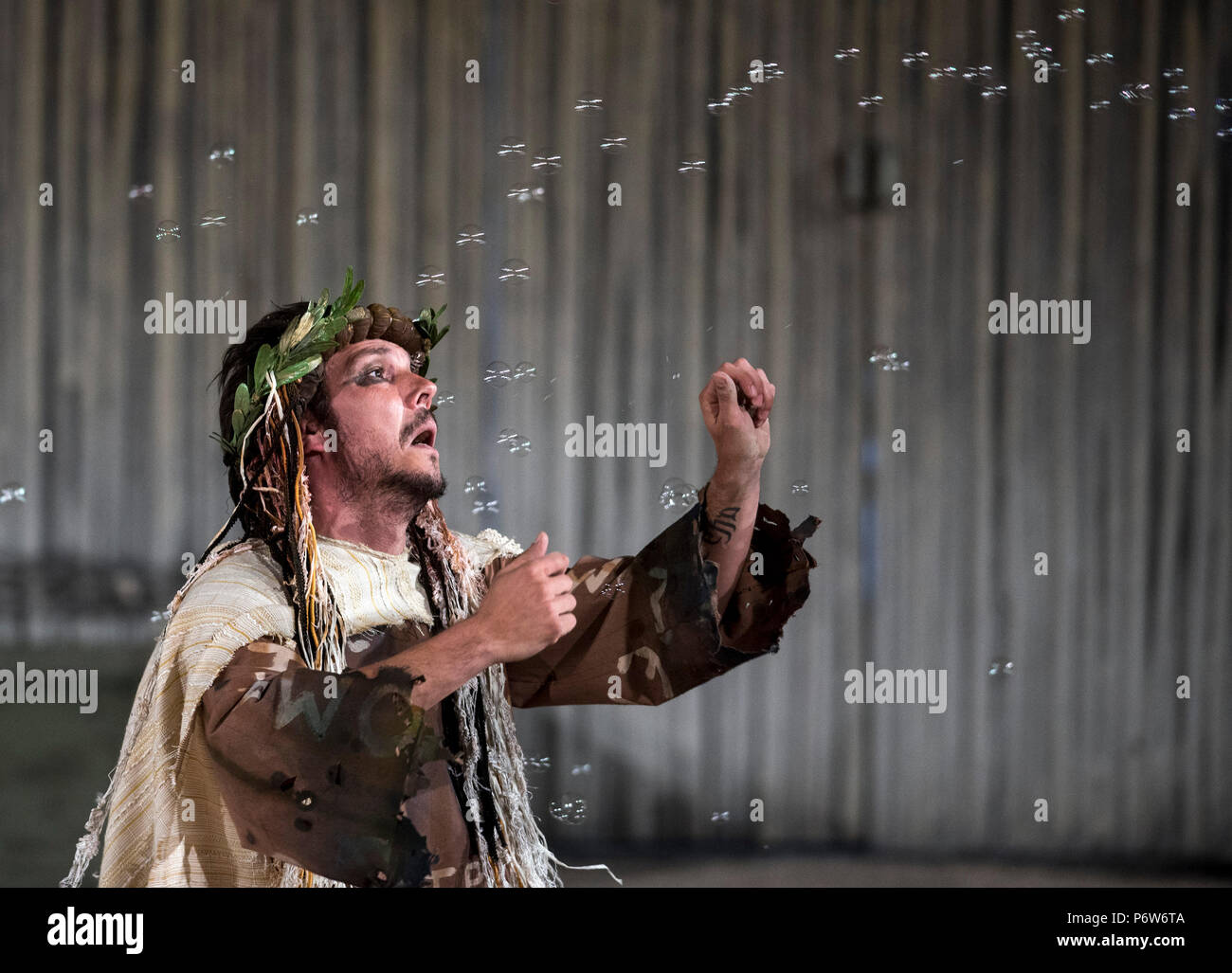 Actors perform during the presentation of the ancient comedy "The ...