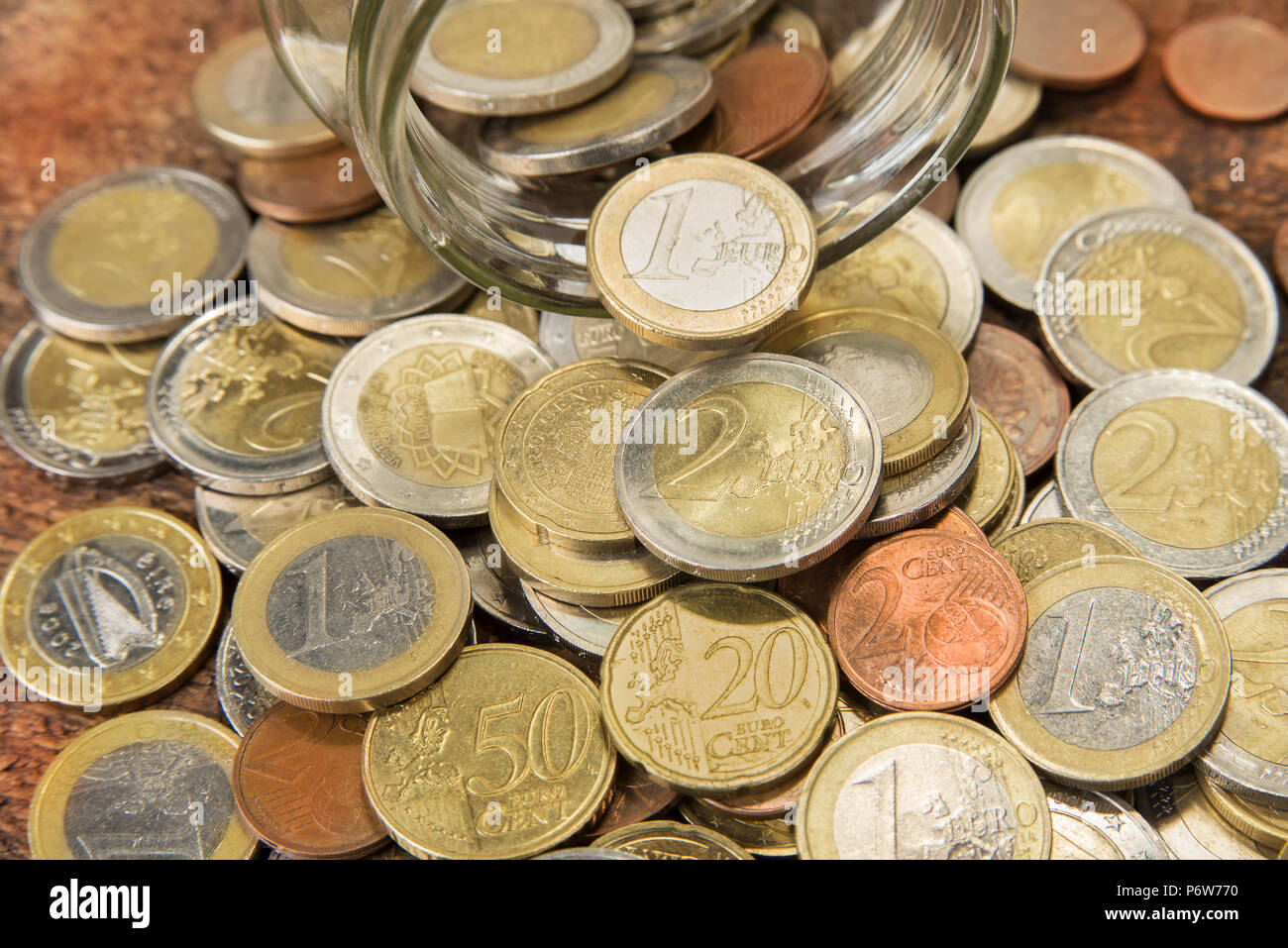 Spilled coins hi-res stock photography and images - Alamy