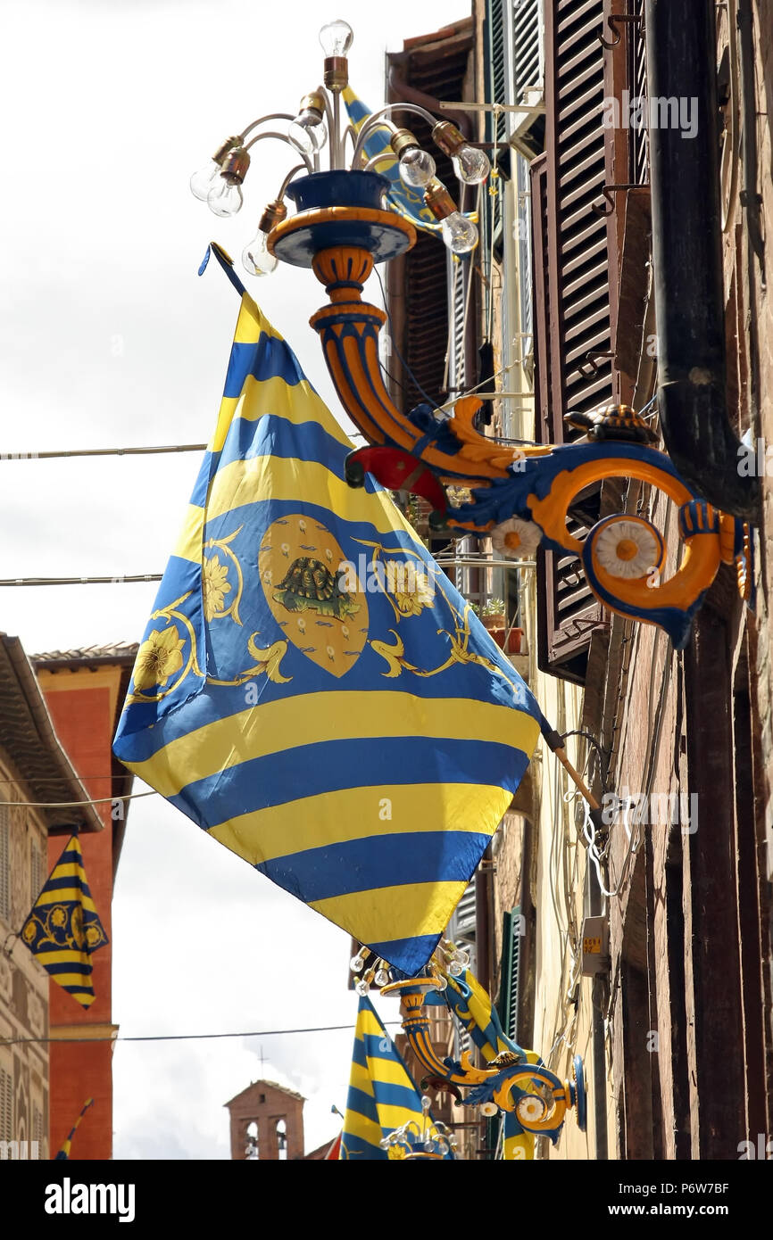 Flags of the contrade of the palio of siena hi-res stock photography ...
