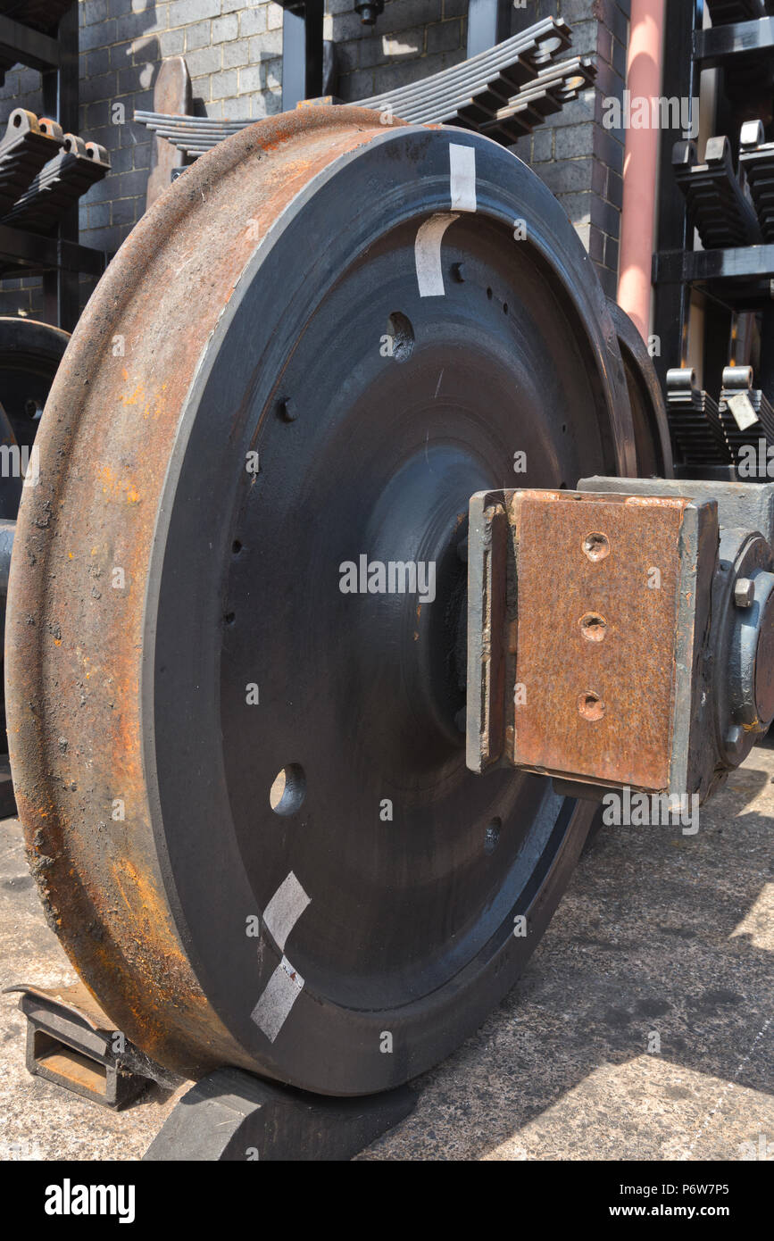 An assortment of train and rolling stock wheels outside the engine ...