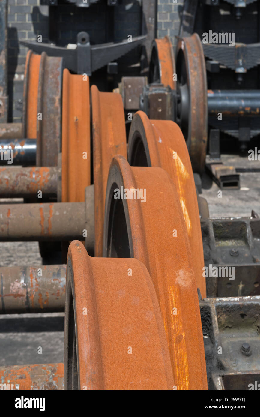 An assortment of train and rolling stock wheels outside the engine ...