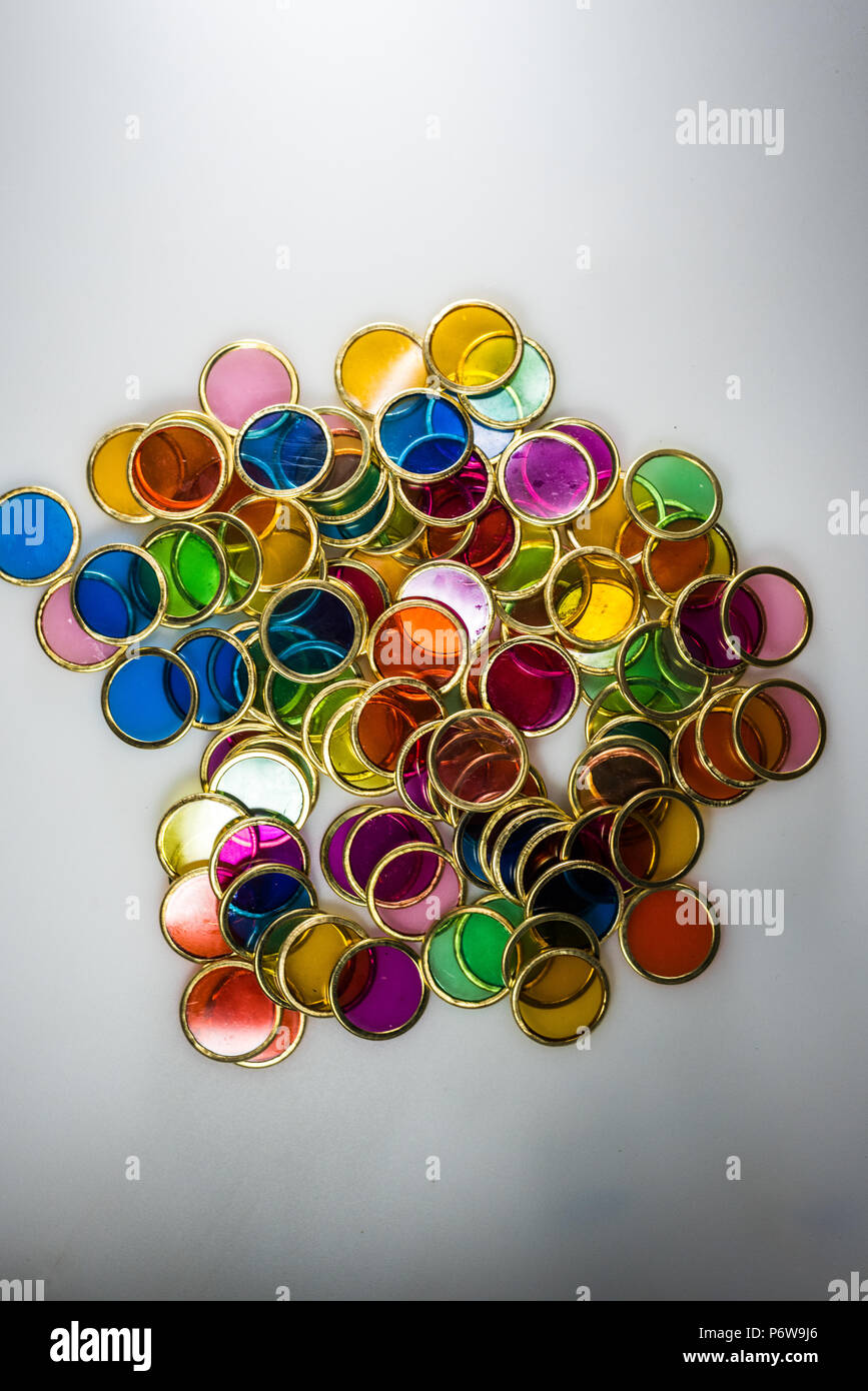 Bright and transparent colored coins to play learn to count Stock Photo ...