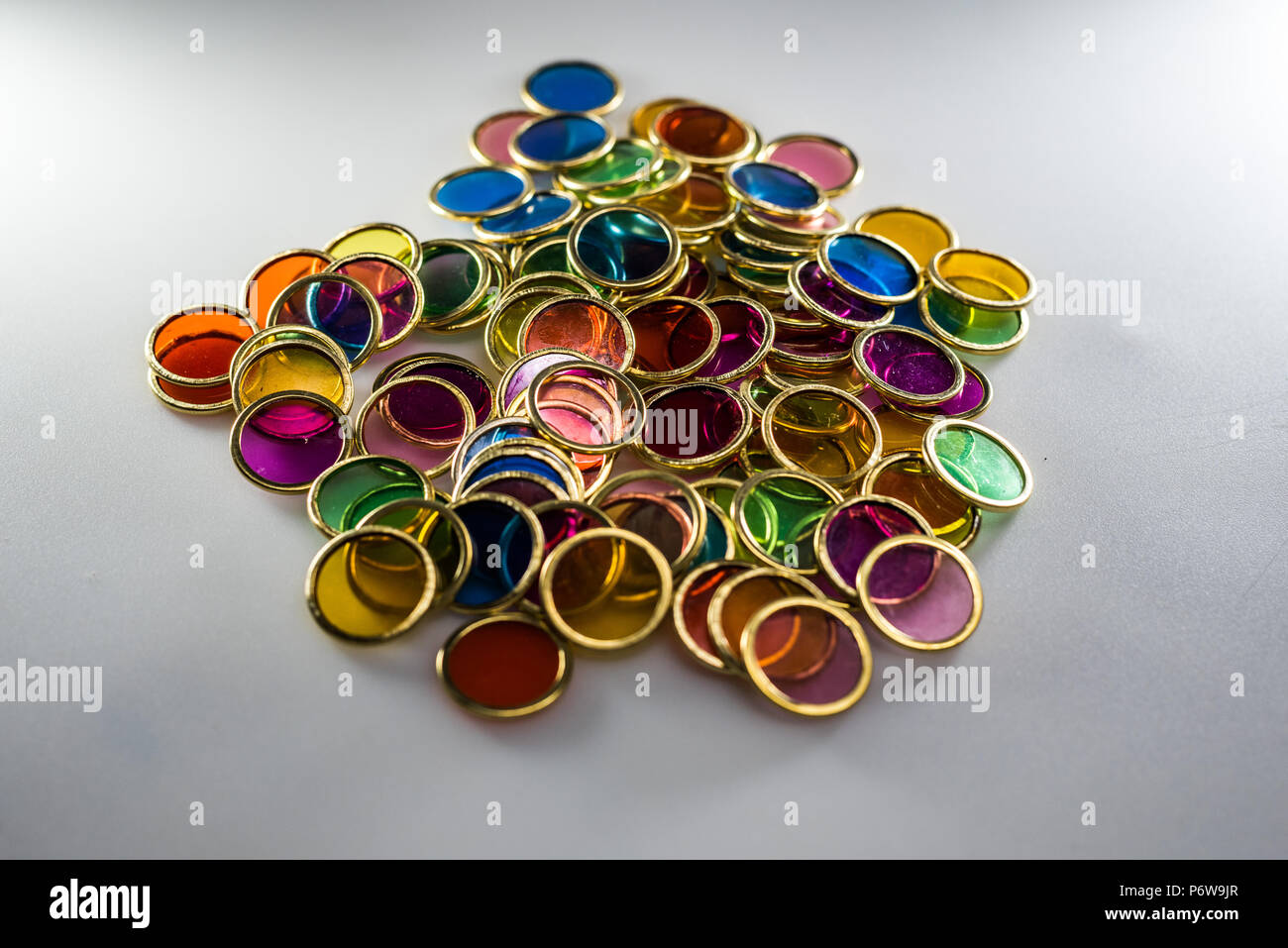 Bright and transparent colored coins to play learn to count Stock Photo ...