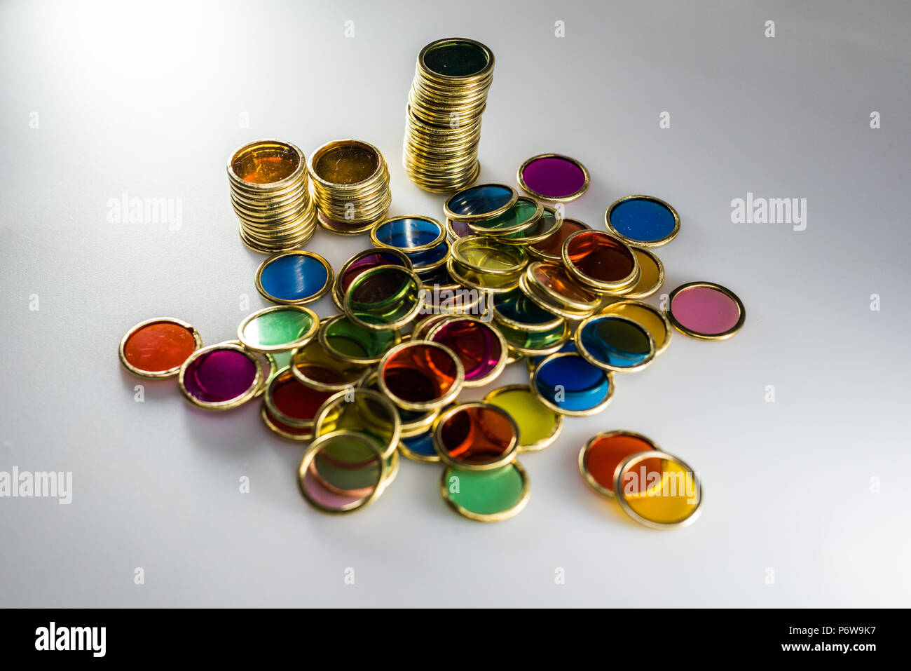 Bright and transparent colored coins to play learn to count Stock Photo ...
