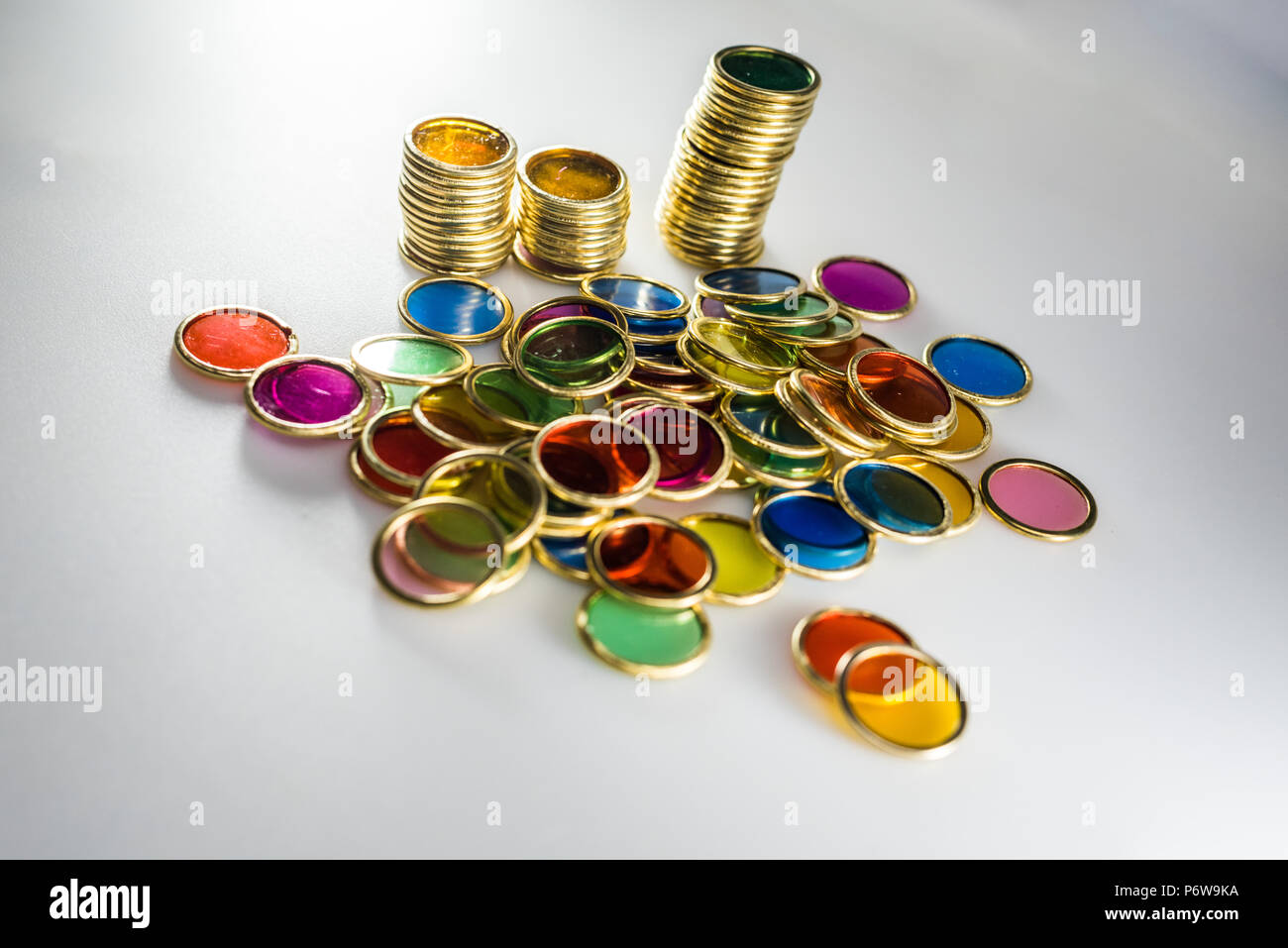 Bright and transparent colored coins to play learn to count Stock Photo ...
