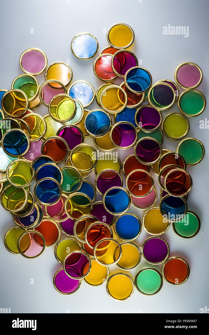 Bright and transparent colored coins to play learn to count Stock Photo ...