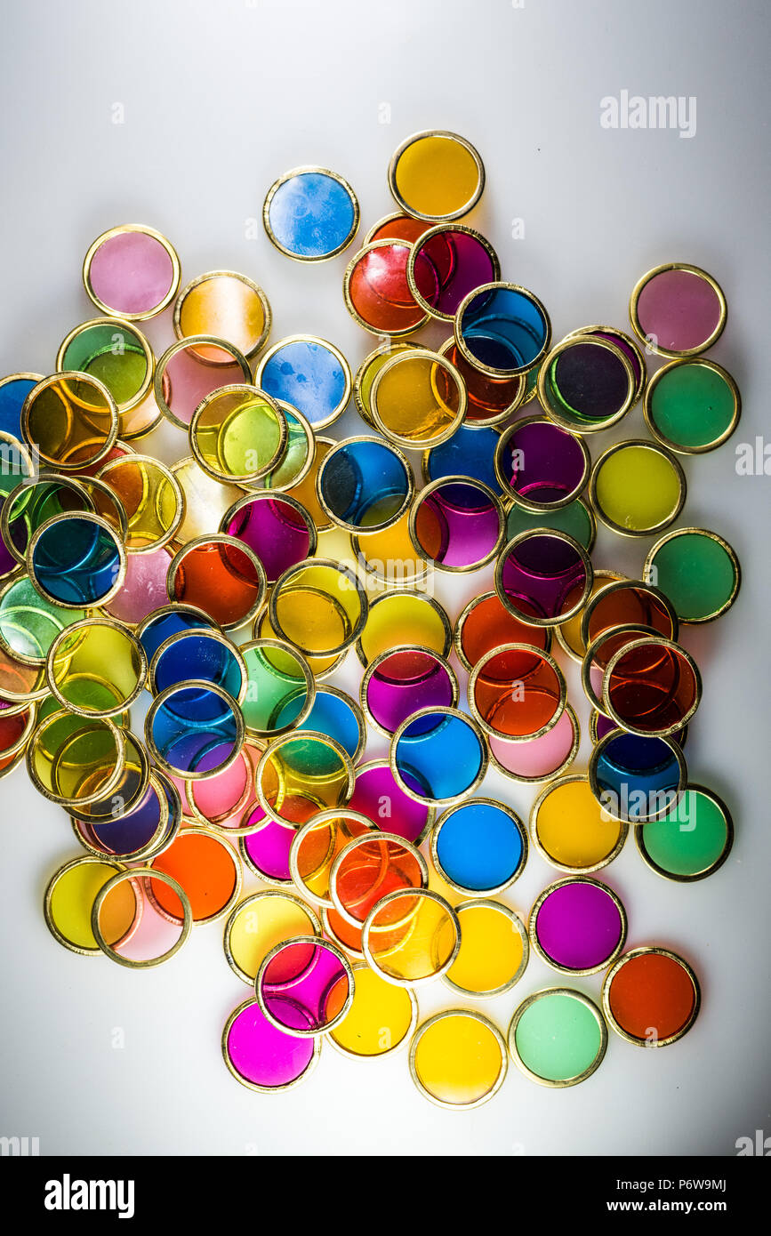 Bright and transparent colored coins to play learn to count Stock Photo ...