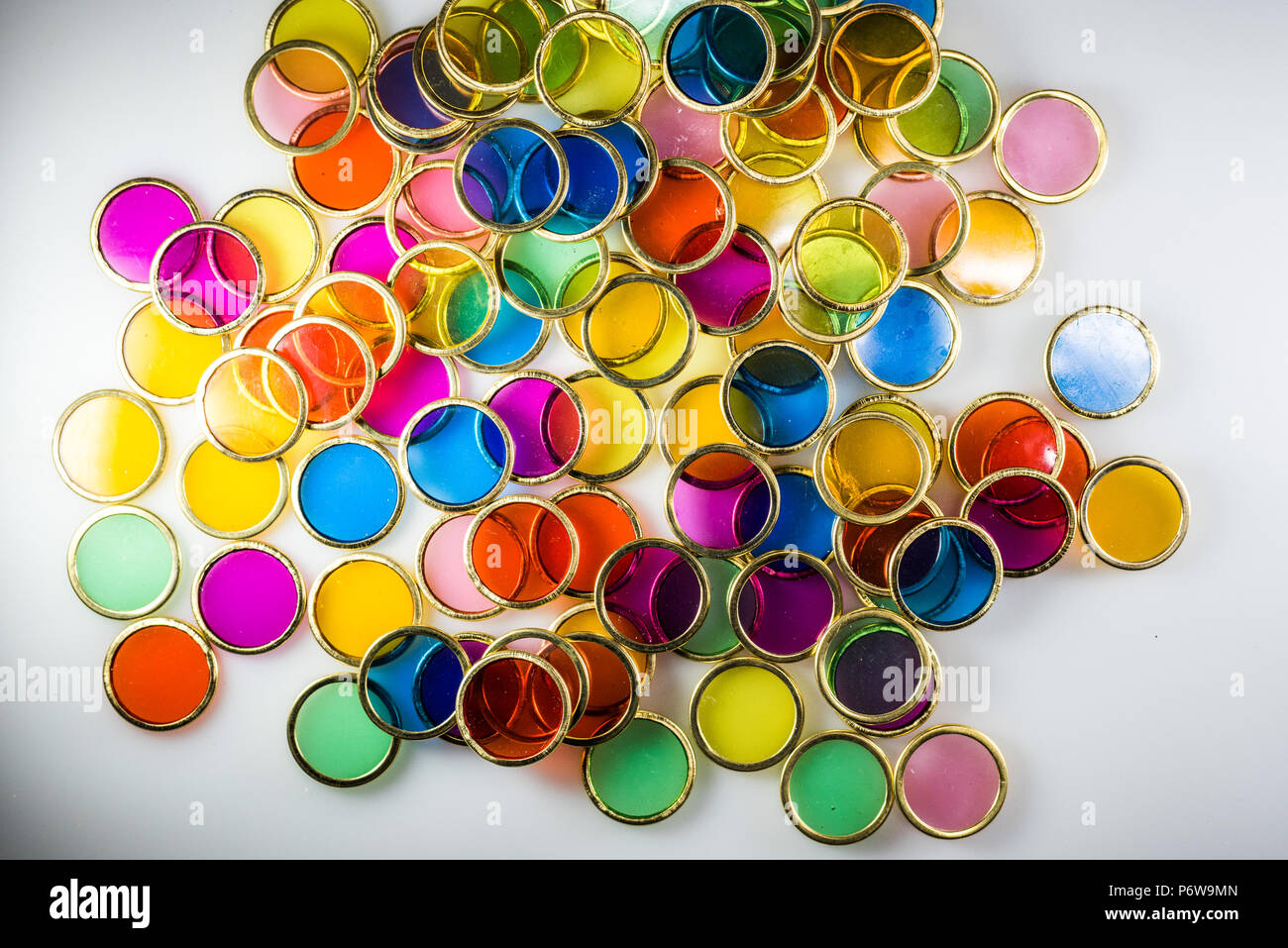 Bright and transparent colored coins to play learn to count Stock Photo ...