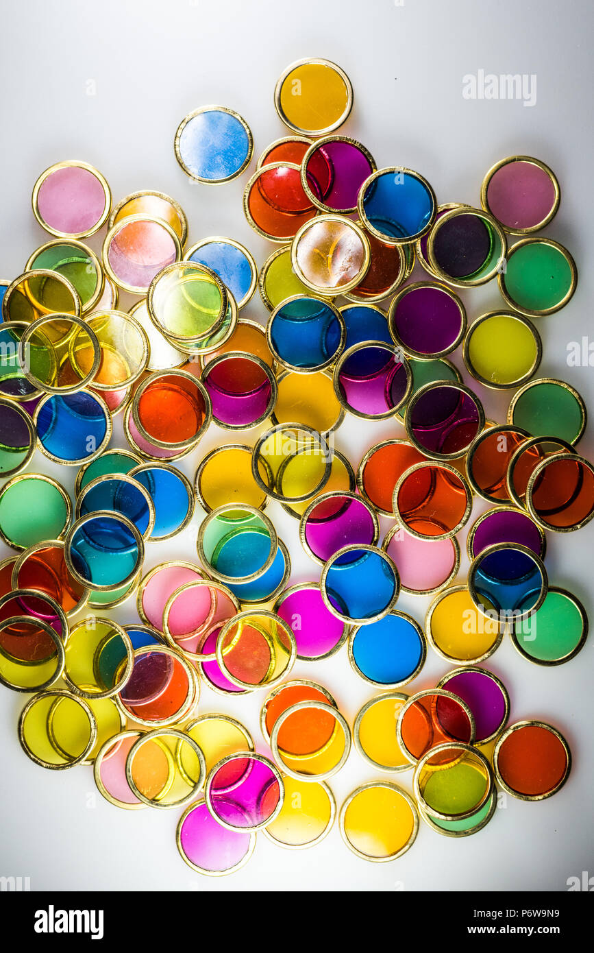 Bright and transparent colored coins to play learn to count Stock Photo ...