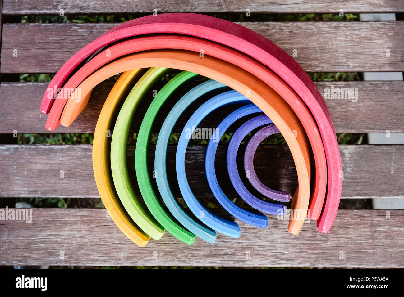 Wooden rainbow toy with many colors for children learning Stock Photo ...