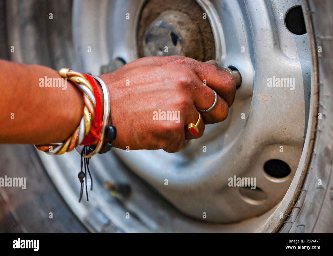 Replacing the wheels of the car on the road on their own Stock Photo ...