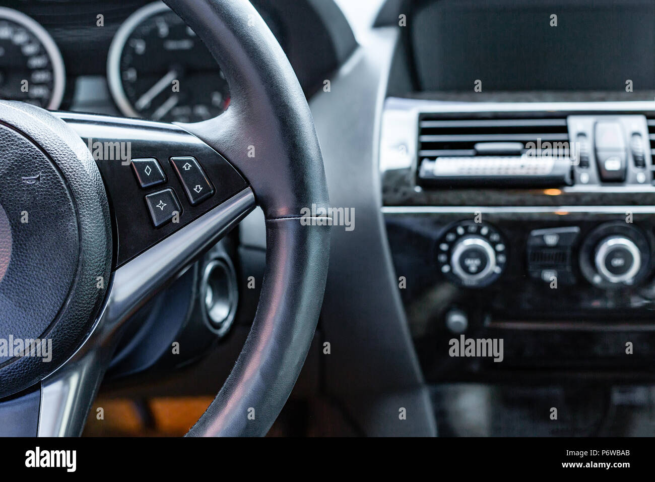 car interior. Modern car speedometer and dashboard. Luxurious car ...