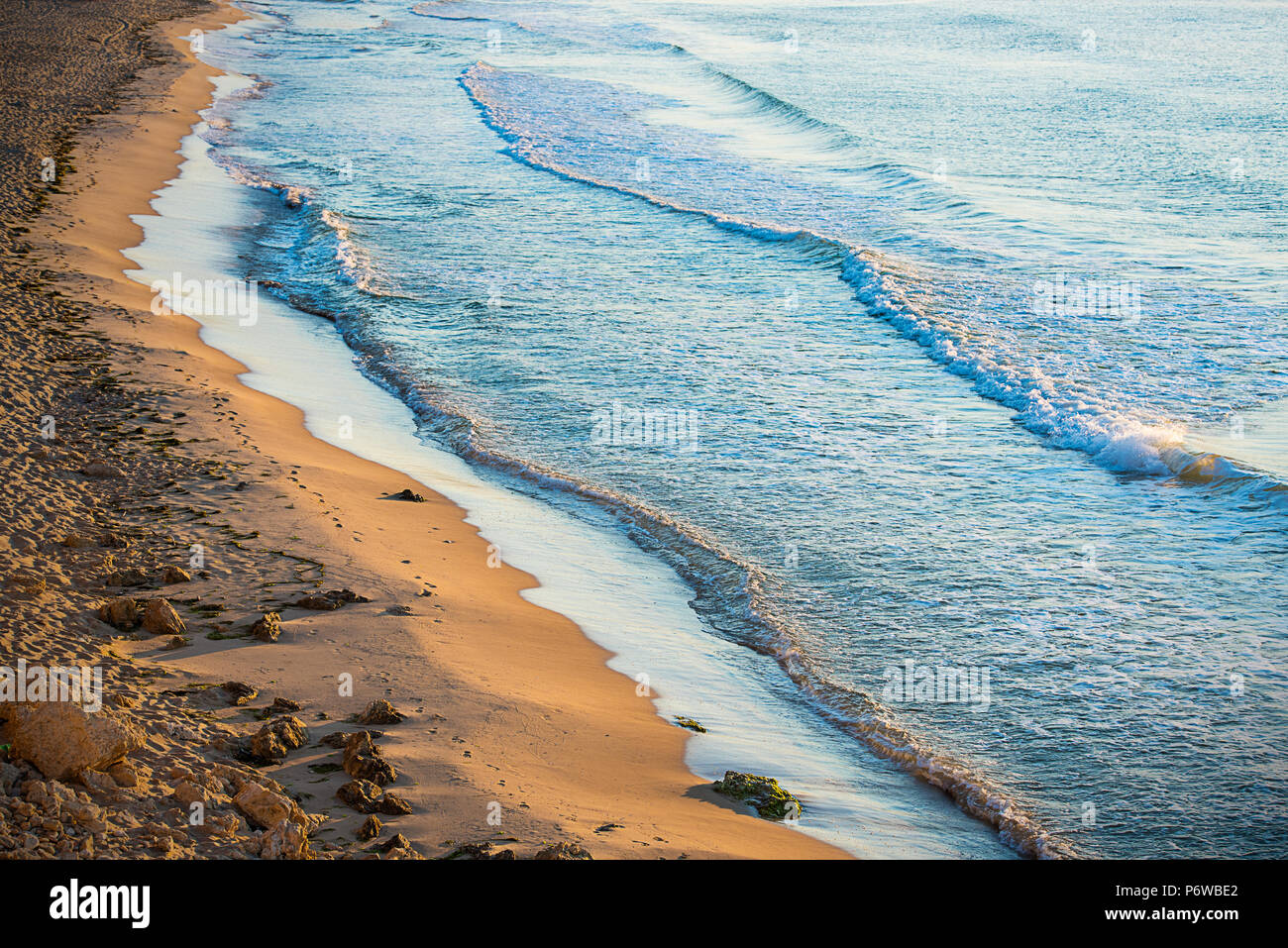 Tropical sandy beach and blue ocean Stock Photo - Alamy