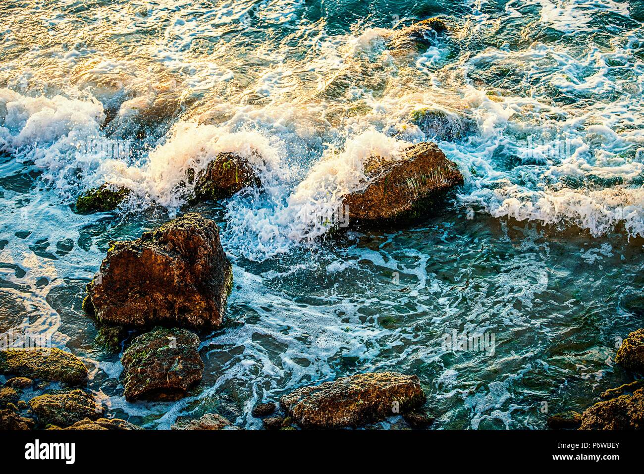 Crashing waves on the beach Stock Photo - Alamy