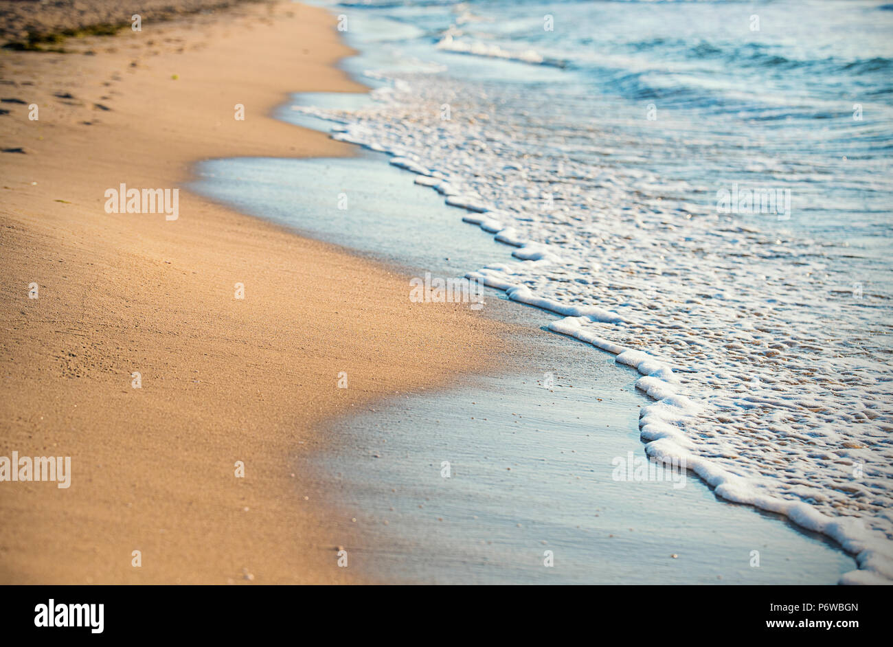 Tropical sandy beach and blue ocean Stock Photo - Alamy