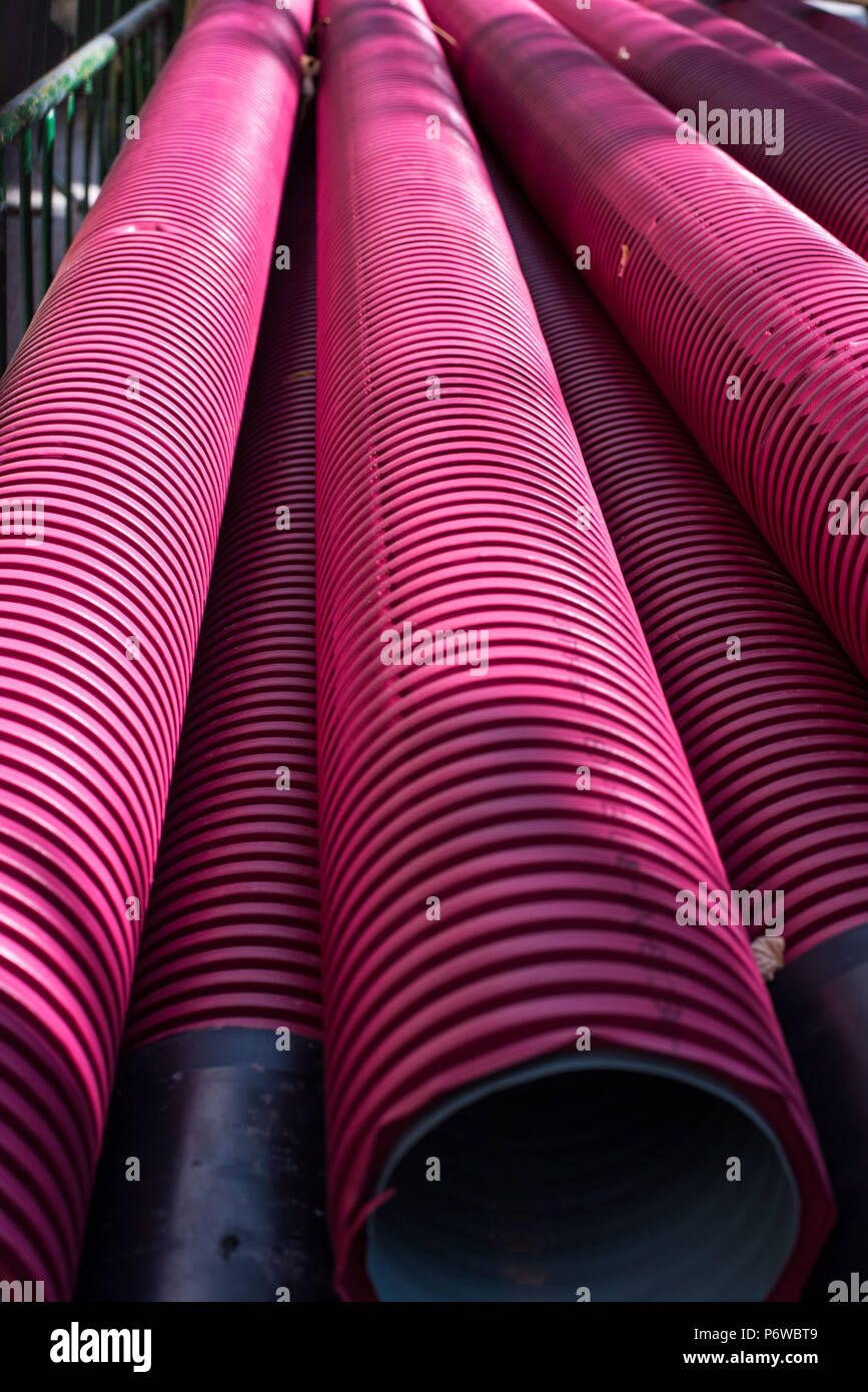 Large pipes for underground electrical cables Stock Photo - Alamy