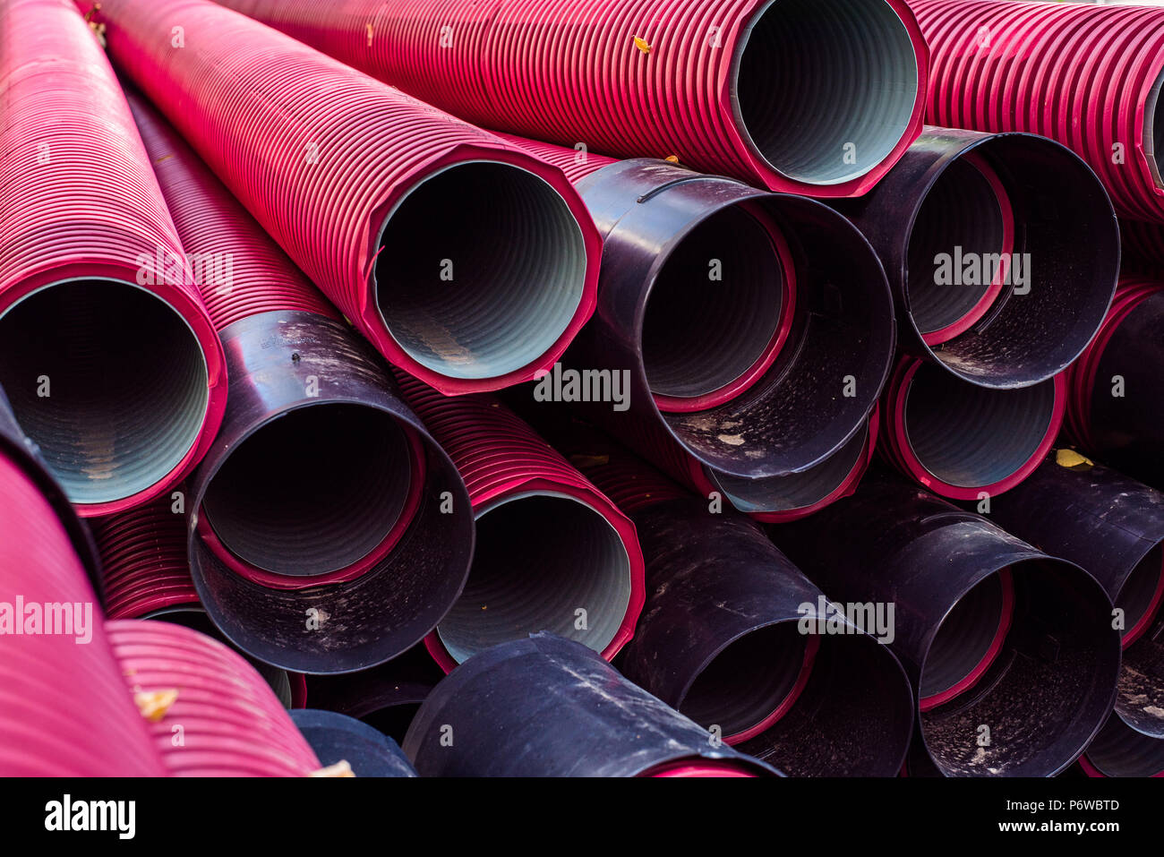 Large pipes for underground electrical cables Stock Photo - Alamy