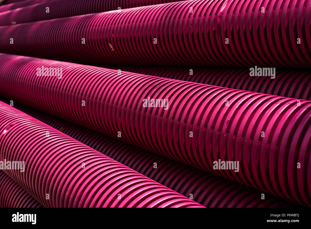 Large pipes for underground electrical cables Stock Photo - Alamy