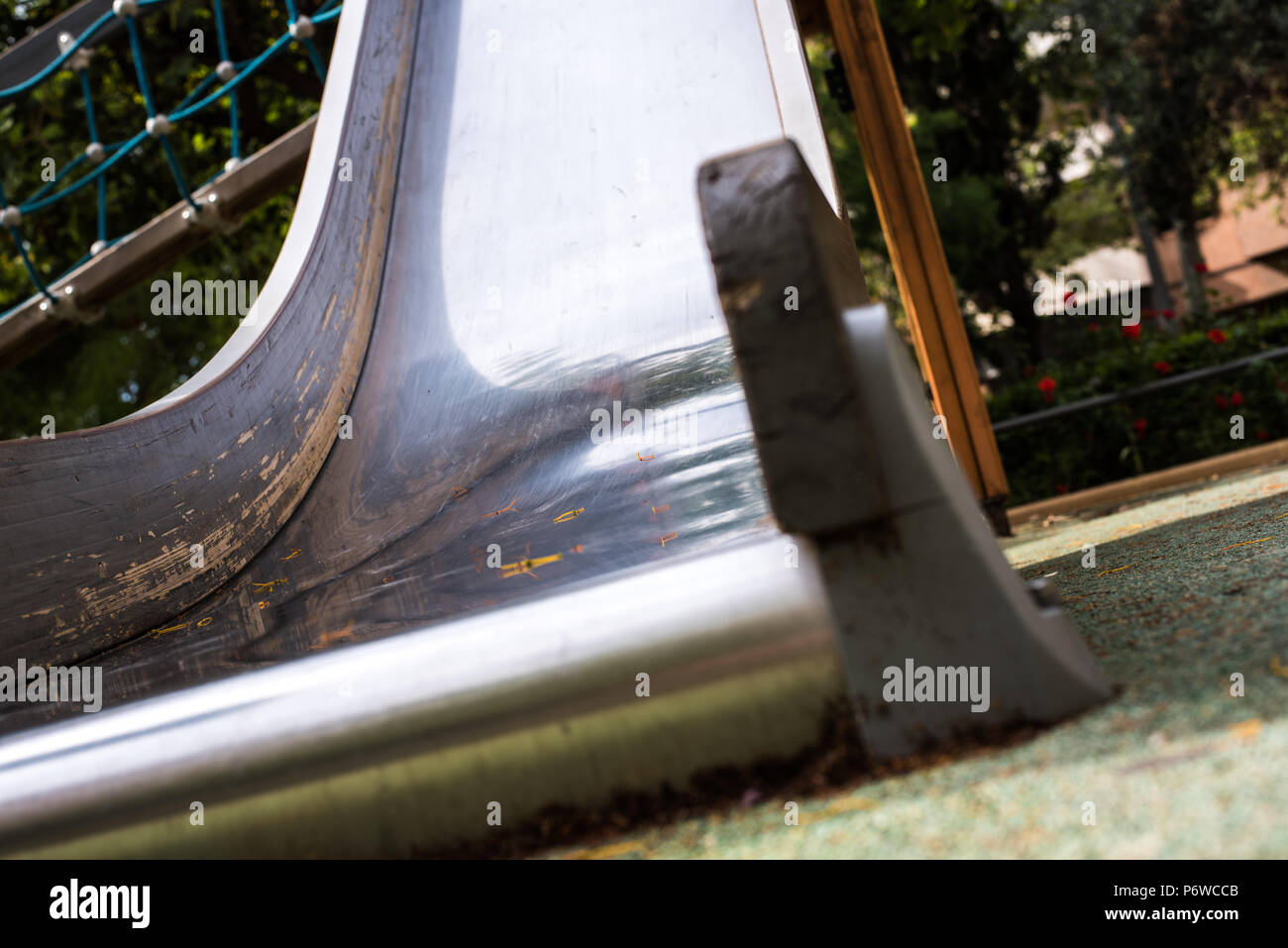 Slide in a metal playground Stock Photo - Alamy