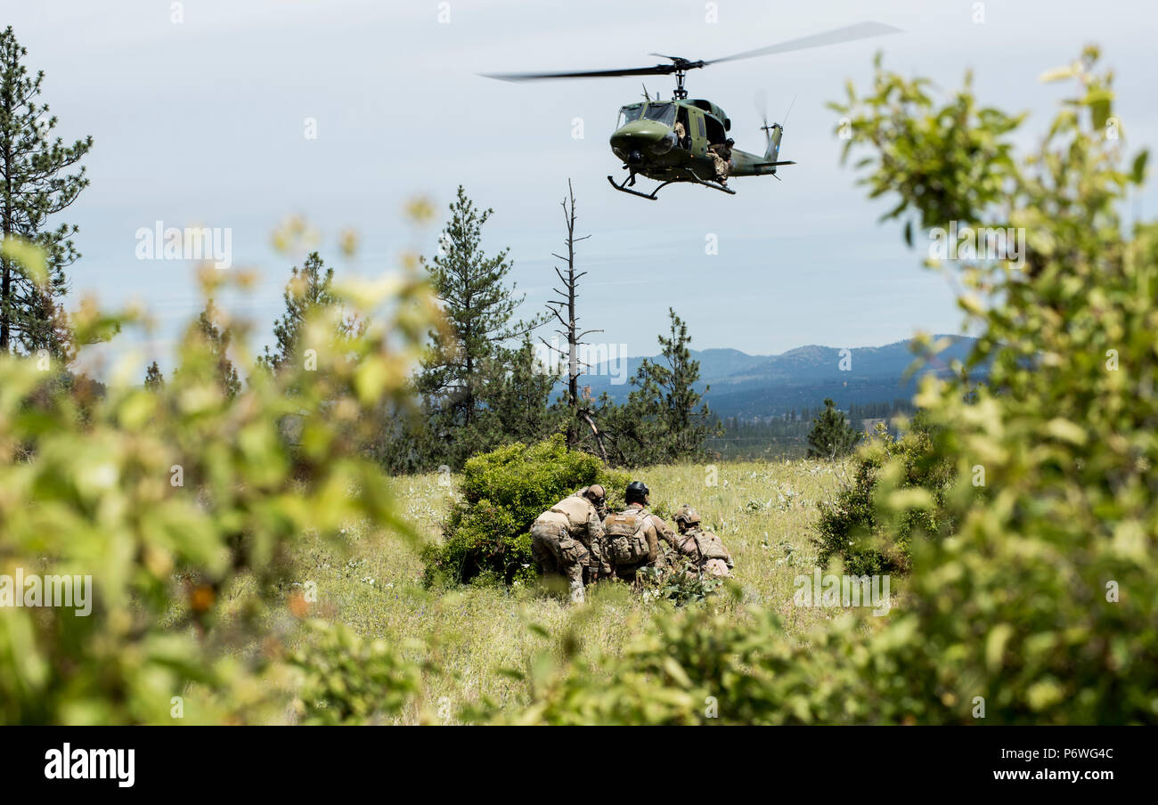 Pararescuemen prepare to medically evacuate an isolated personnel ...