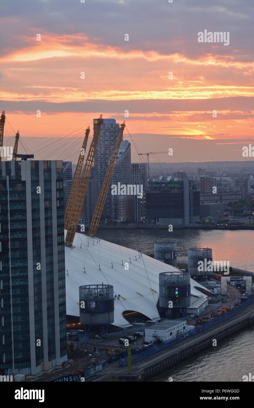The Canary Wharf skyline and O2 Stadium as seen from the Air Line sky ...