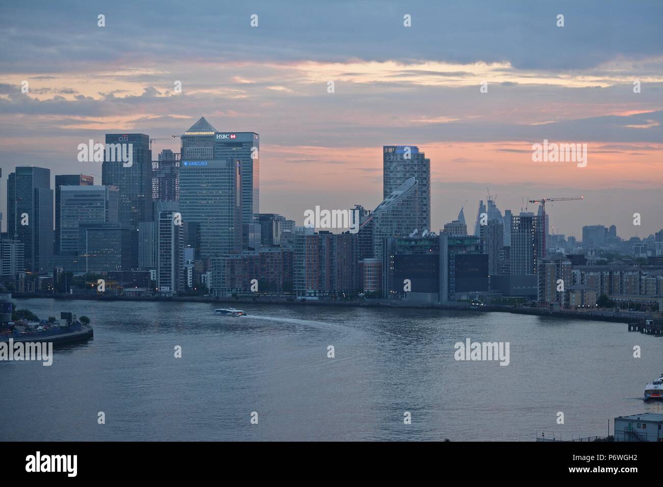 The Canary Wharf skyline and O2 Stadium as seen from the Air Line sky ...