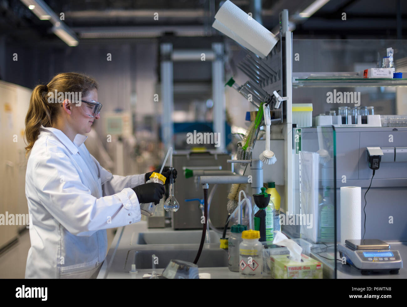 Dresden, Germany. 03rd July, 2018. An employee of the Fraunhofer ...
