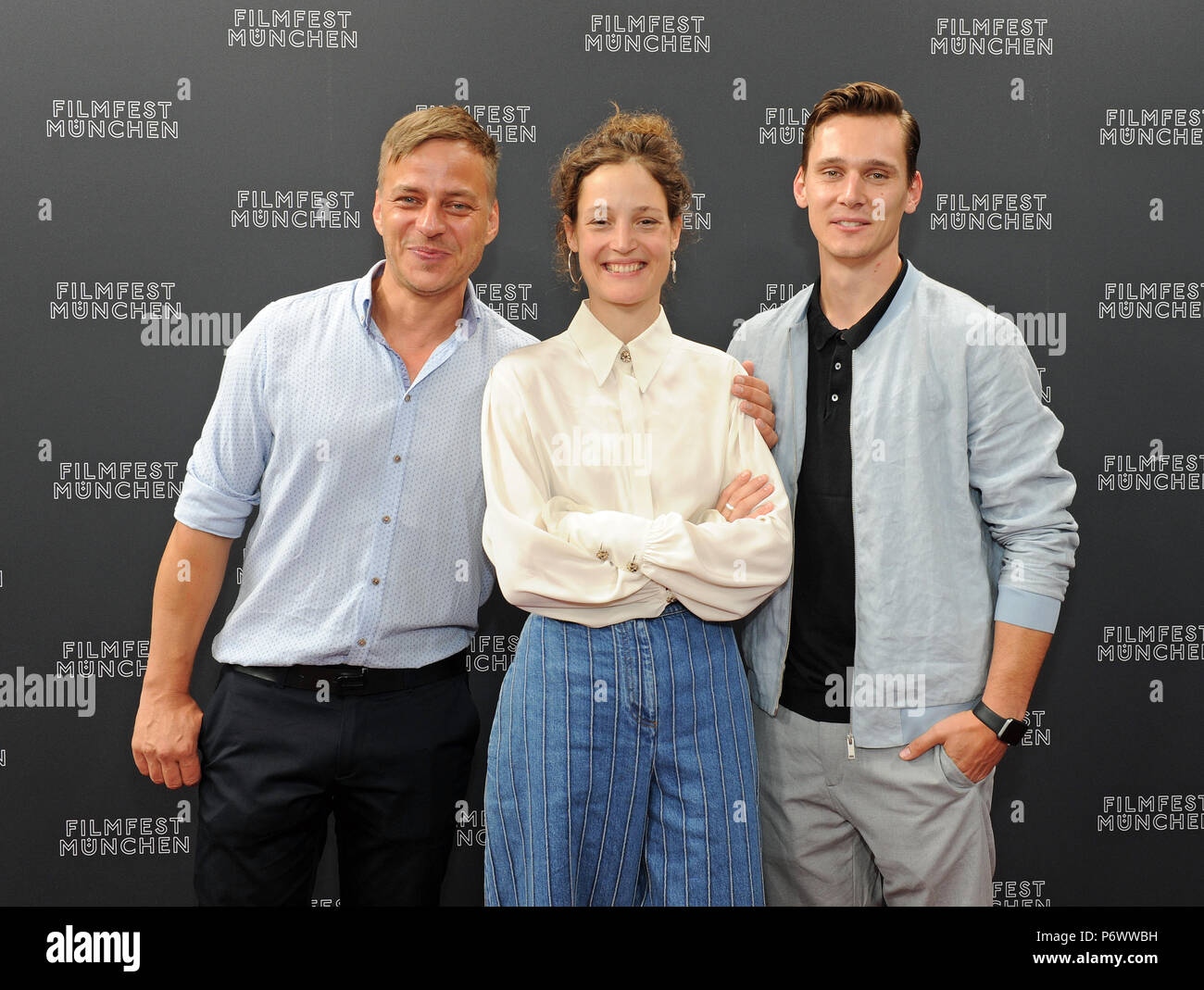 03 July 2018, Germany, Munich: Actors Tom Wlaschiha (left to right ...