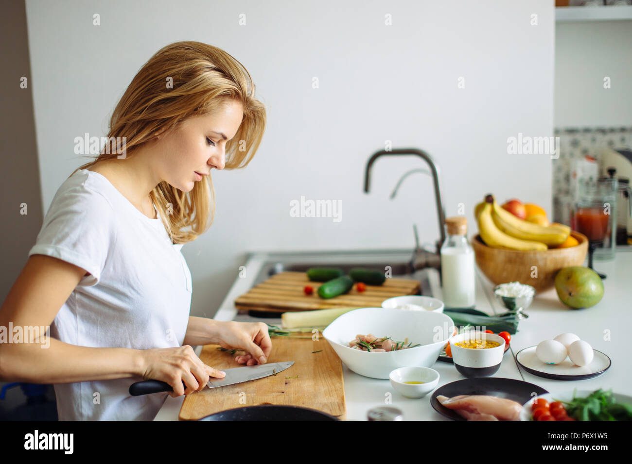 Female cooker hi-res stock photography and images - Alamy