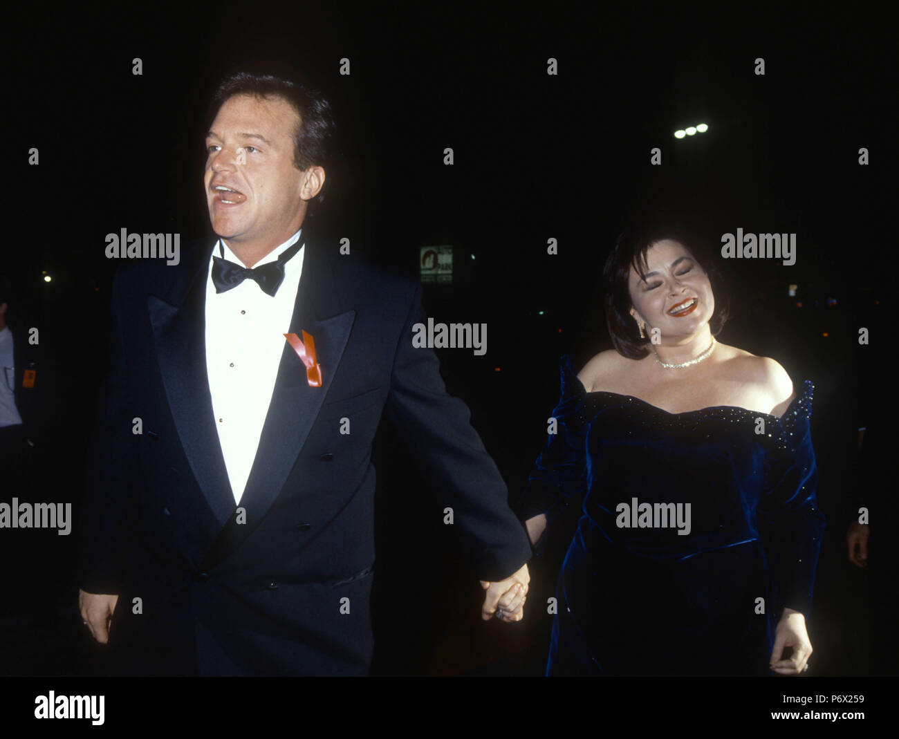 HOLLYWOOD, CA - JANUARY 12: (L-R) Actor Tom Arnold and wife actress ...