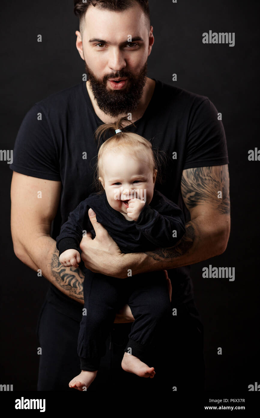 Portrait of masculine adult man with strong body in perfect fit with ...