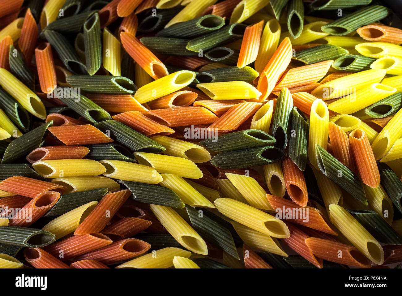 Macaroni tricolor with organic pasta integral Stock Photo - Alamy