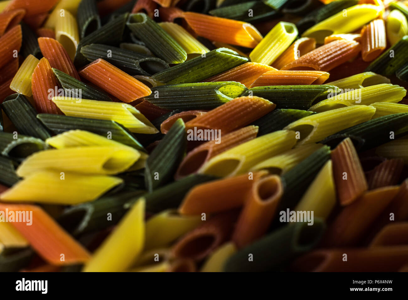 Macaroni tricolor with organic pasta integral Stock Photo - Alamy