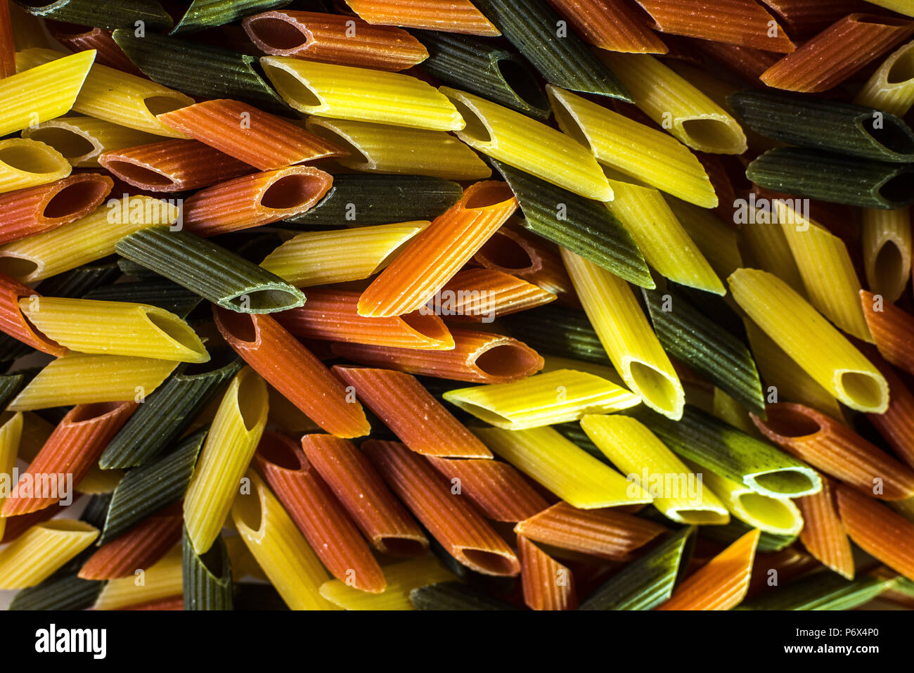 Macaroni tricolor with organic pasta integral Stock Photo - Alamy